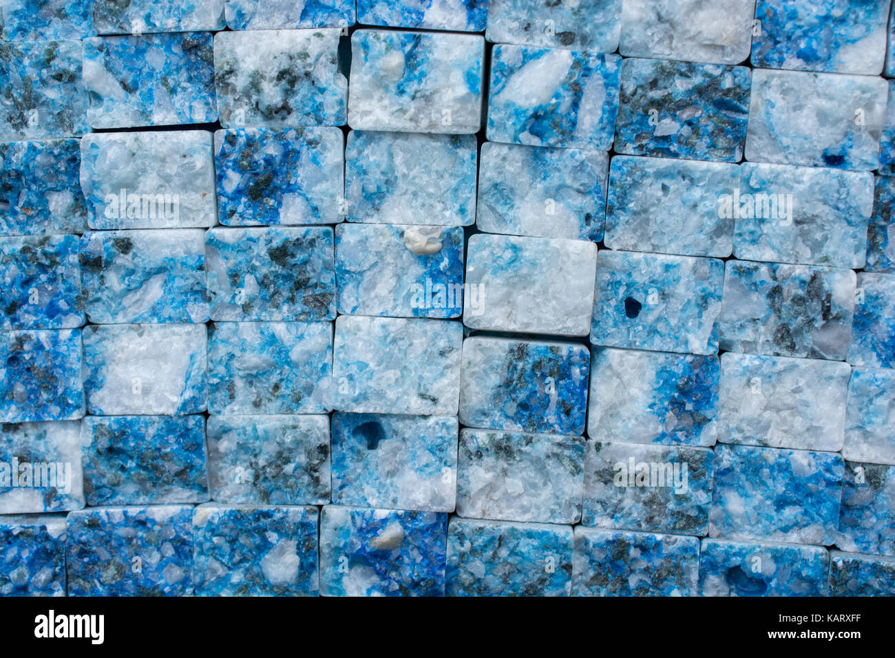 Decorative cubic stone wall as background texture Stock Photo - Alamy