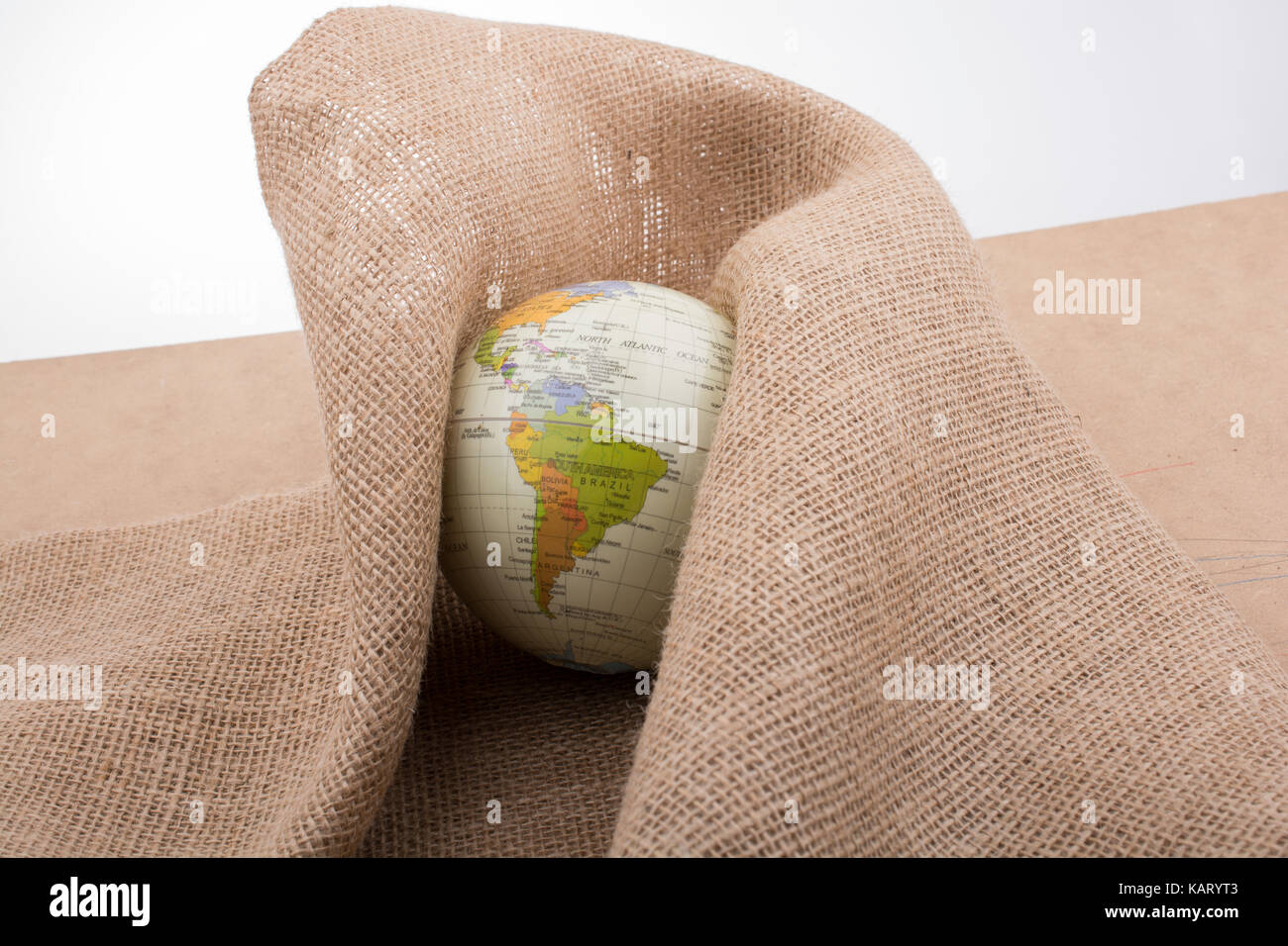 Globe is placed on canvas background Stock Photo - Alamy