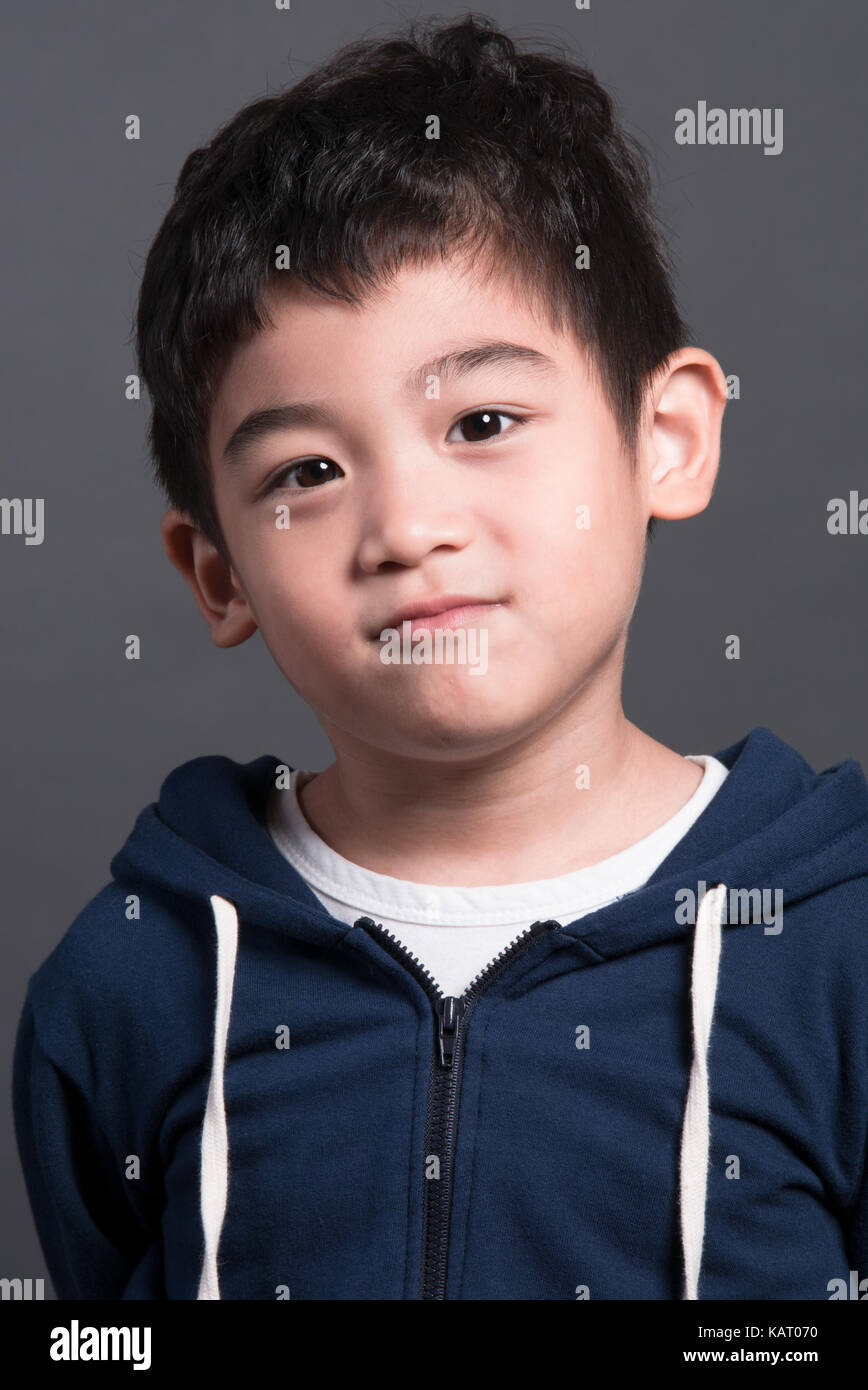 Studio portrait of East Asian male child Stock Photo - Alamy