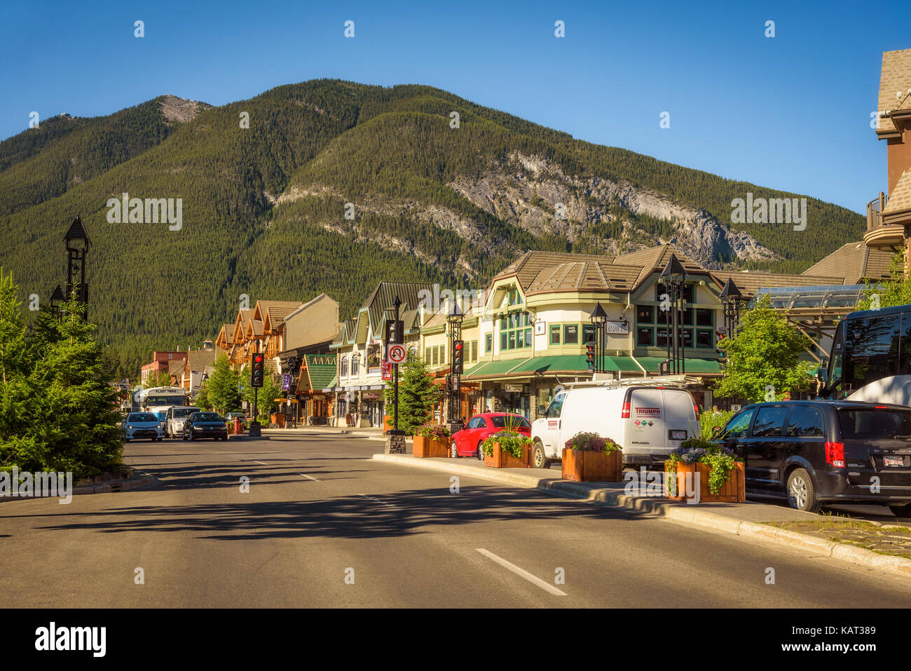 Scenic street view of the Banff main shopping street in a sunny summer ...