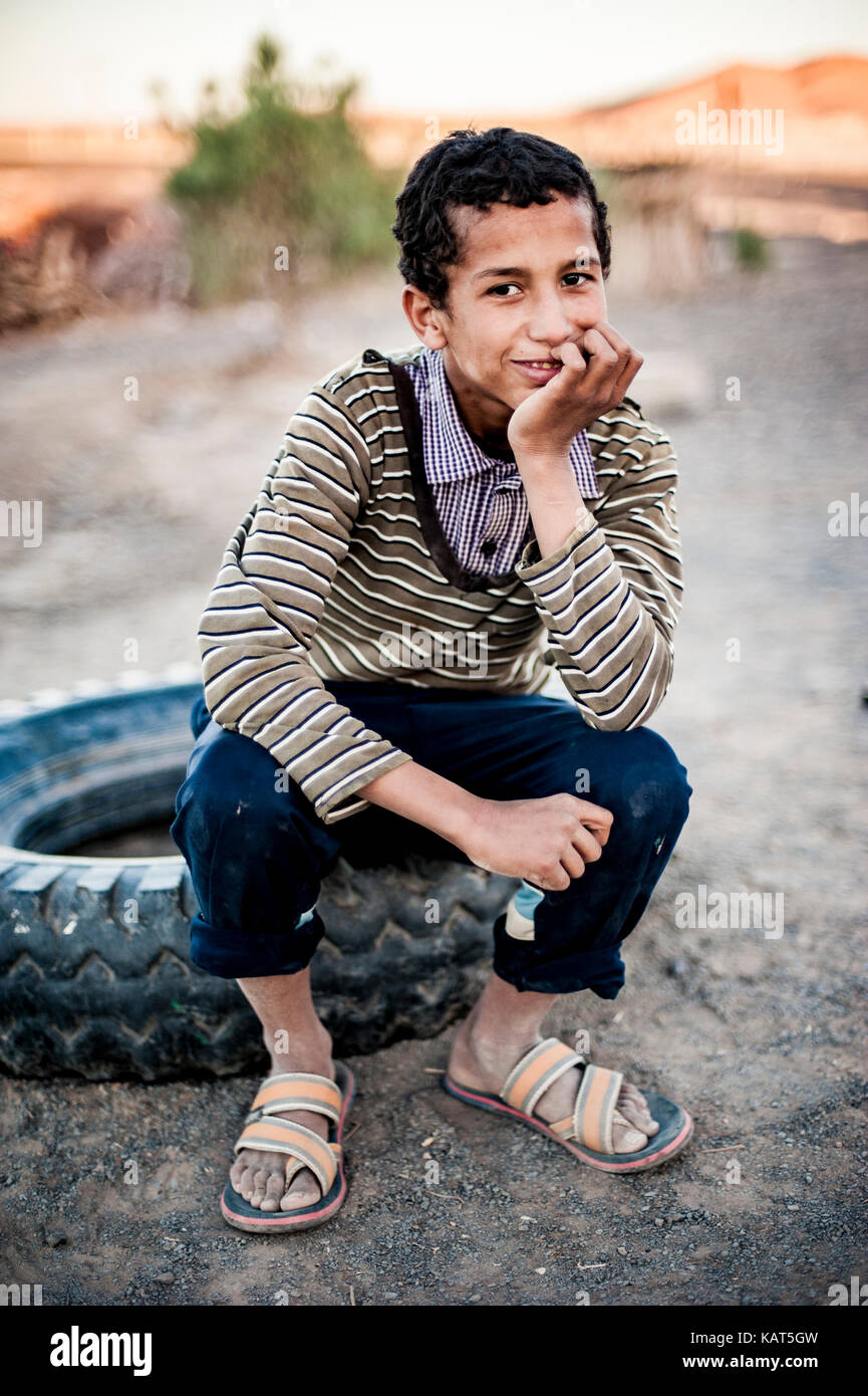 Portrait of a boy near Merzouga, Morocco Stock Photo - Alamy