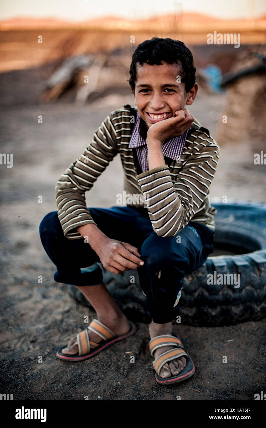 Portrait of a boy near Merzouga, Morocco Stock Photo - Alamy