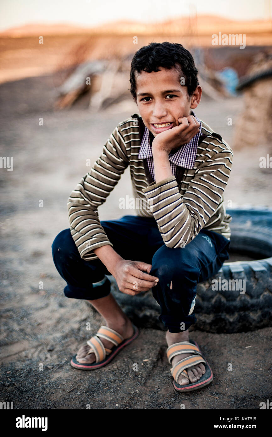 Portrait of a boy near Merzouga, Morocco Stock Photo - Alamy