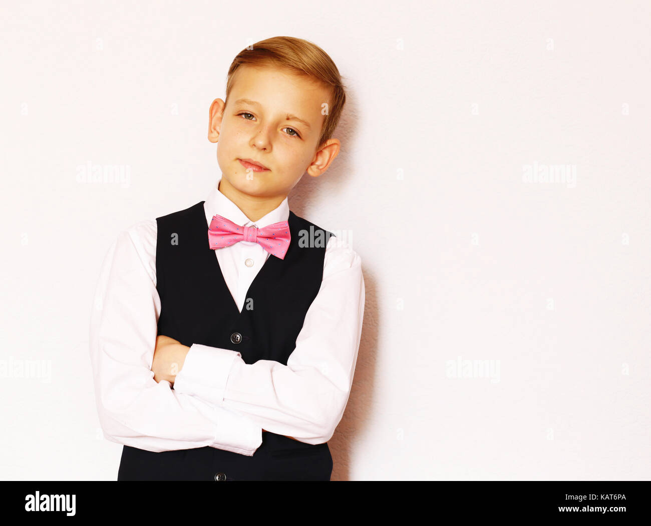 portrait of a boy in a classic suit with a bow tie Stock Photo - Alamy