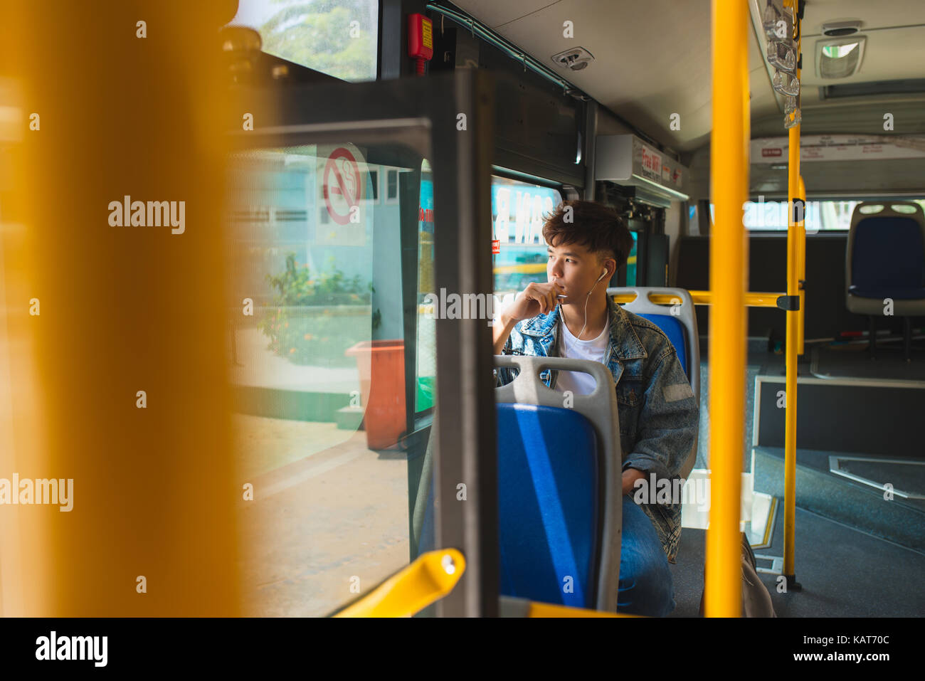 Man looking through bus window High Resolution Stock Photography and ...