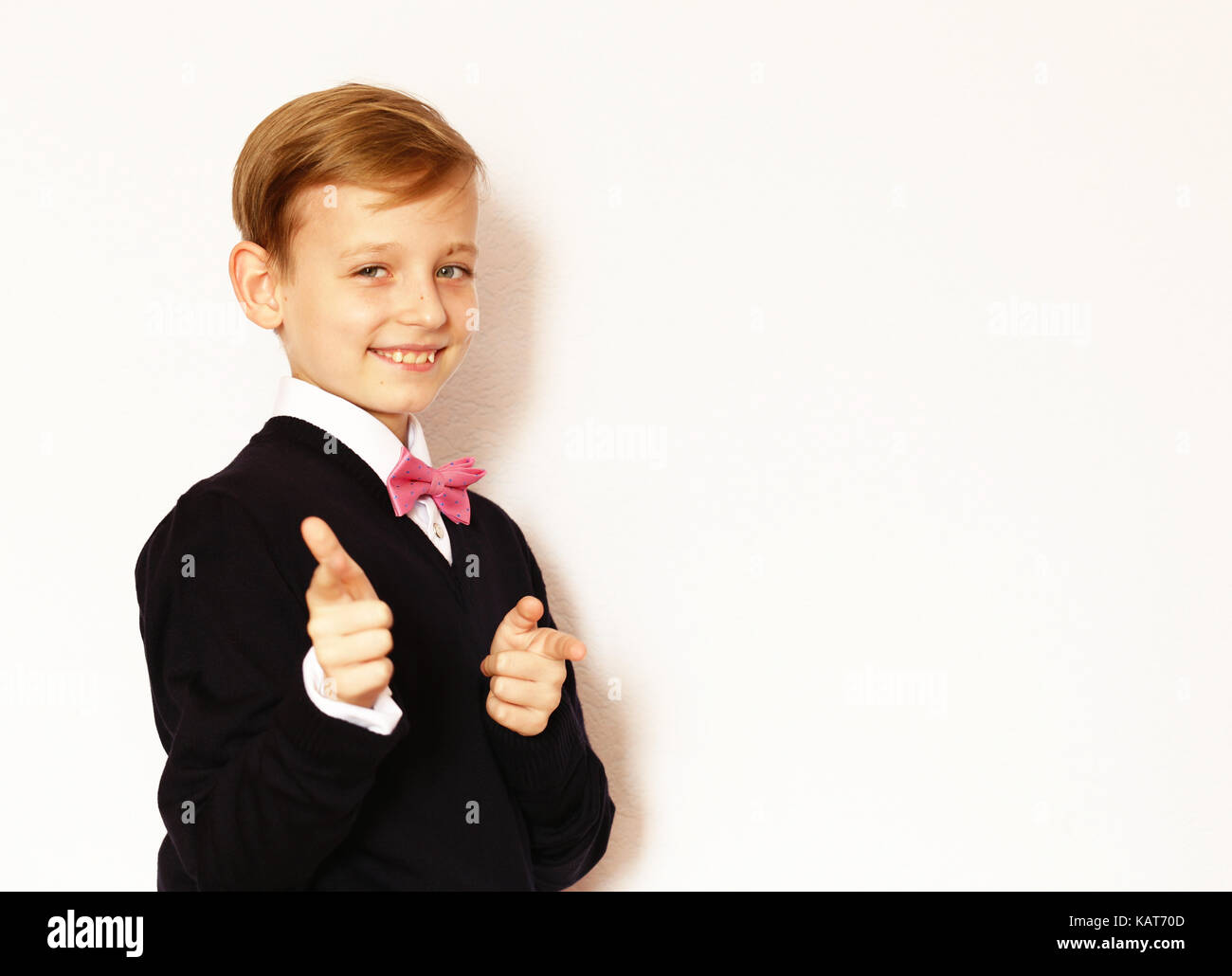 portrait of a boy in a classic suit with a bow tie Stock Photo - Alamy