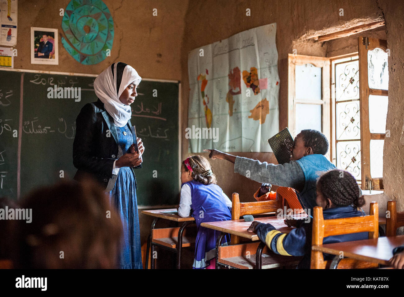 Inside the school with pupils and teacher in Khamila village, Morocco ...