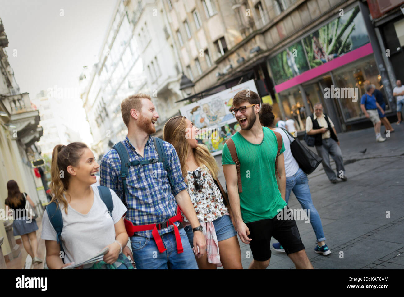 Happy young people having fun outdoors Stock Photo - Alamy