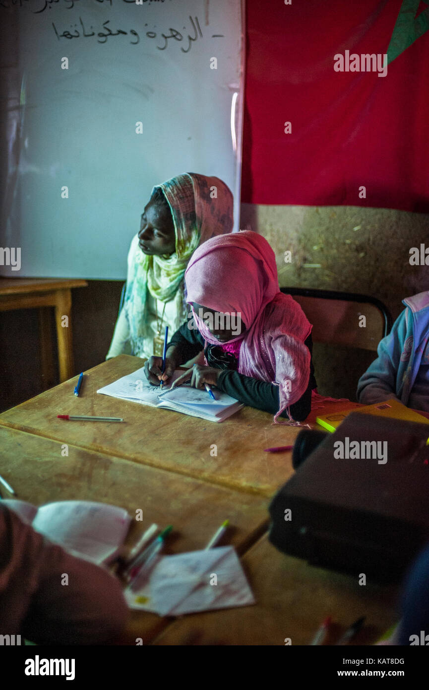 Inside the school with pupils and teacher in Khamila village, Morocco ...
