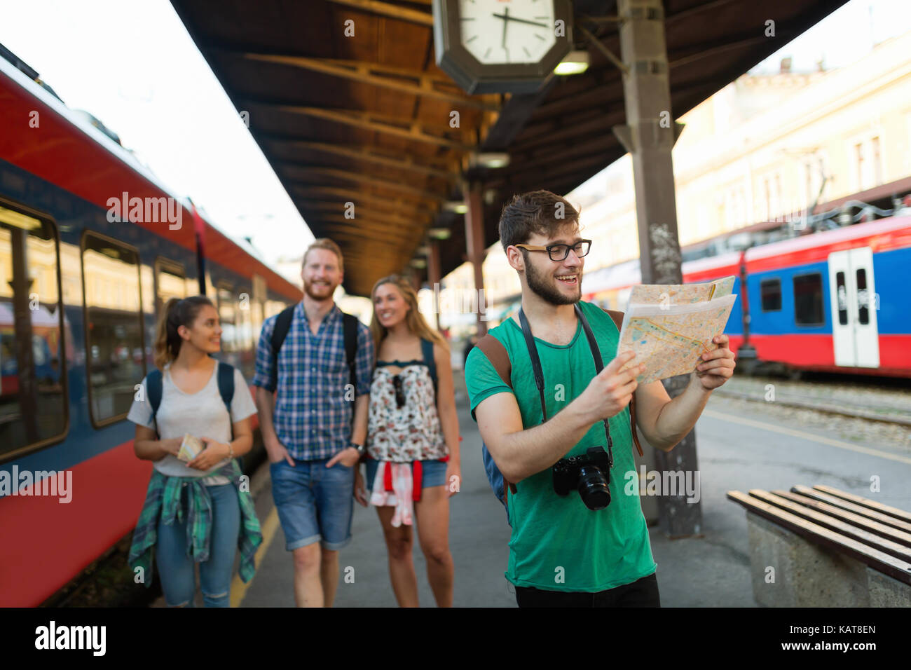 Young tourists travelling by train Stock Photo - Alamy