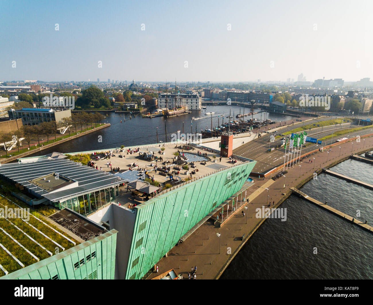 Amsterdam, Netherlands - September 24 2017: Some tourists are resting ...
