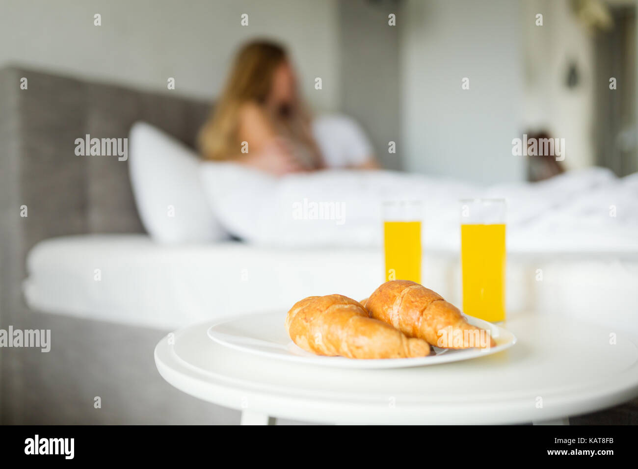 Couple having breakfast in the morning Stock Photo - Alamy