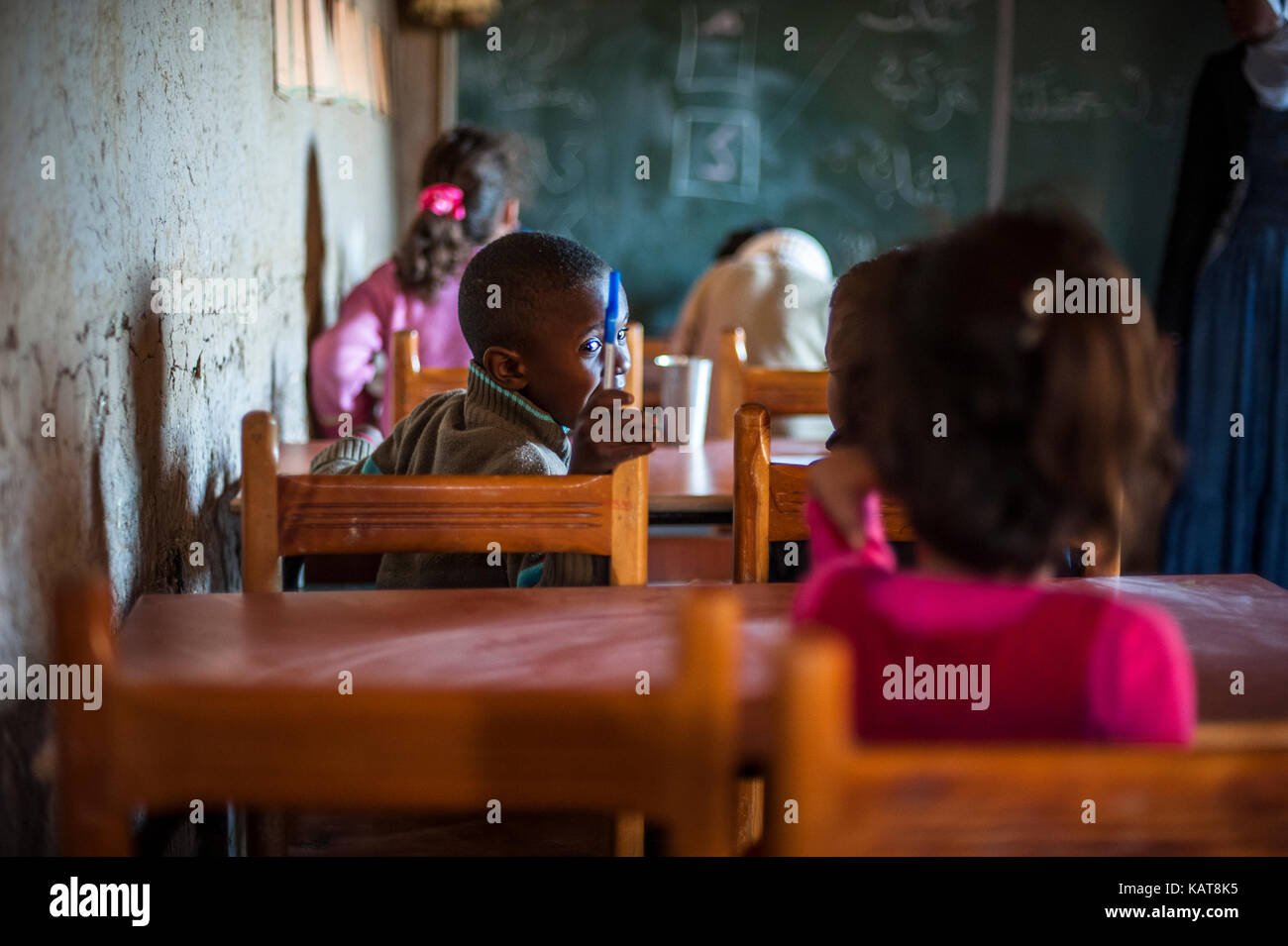 Inside the school with pupils and teacher in Khamila village, Morocco ...