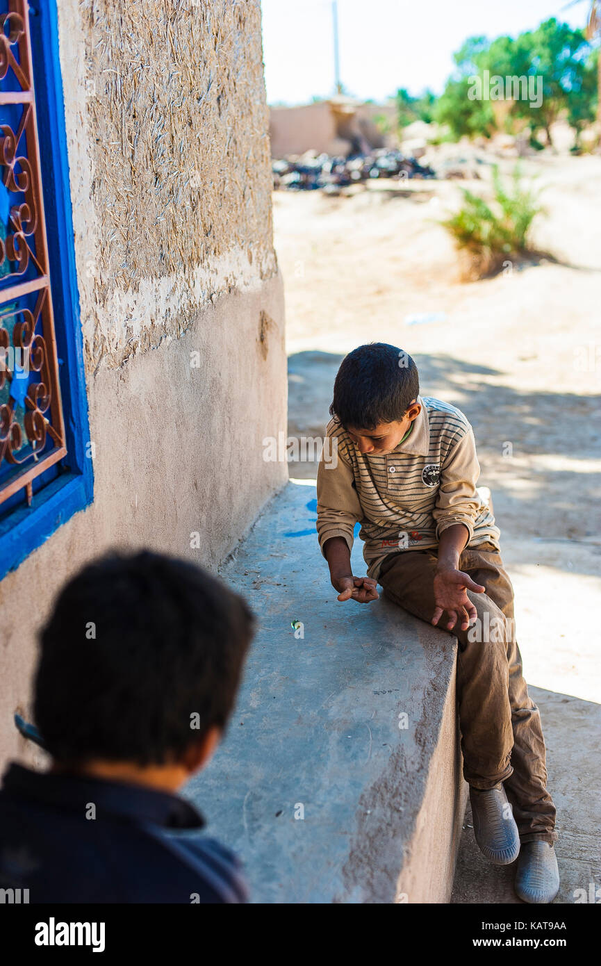 Children playing in village Merzouga, Morocco Stock Photo - Alamy