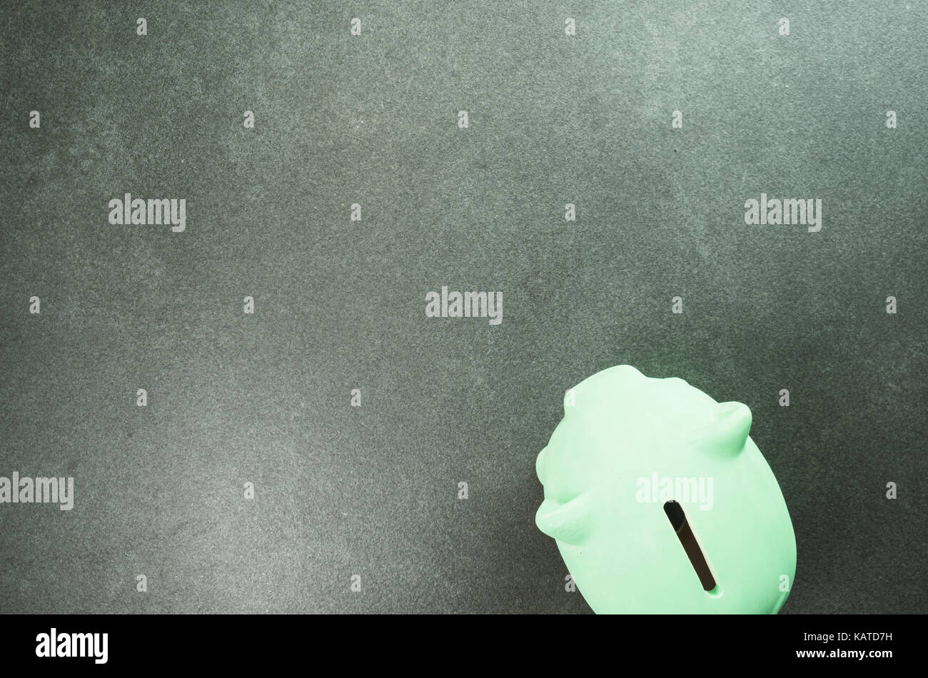 terracotta piggy bank on a stone background - top view Stock Photo - Alamy