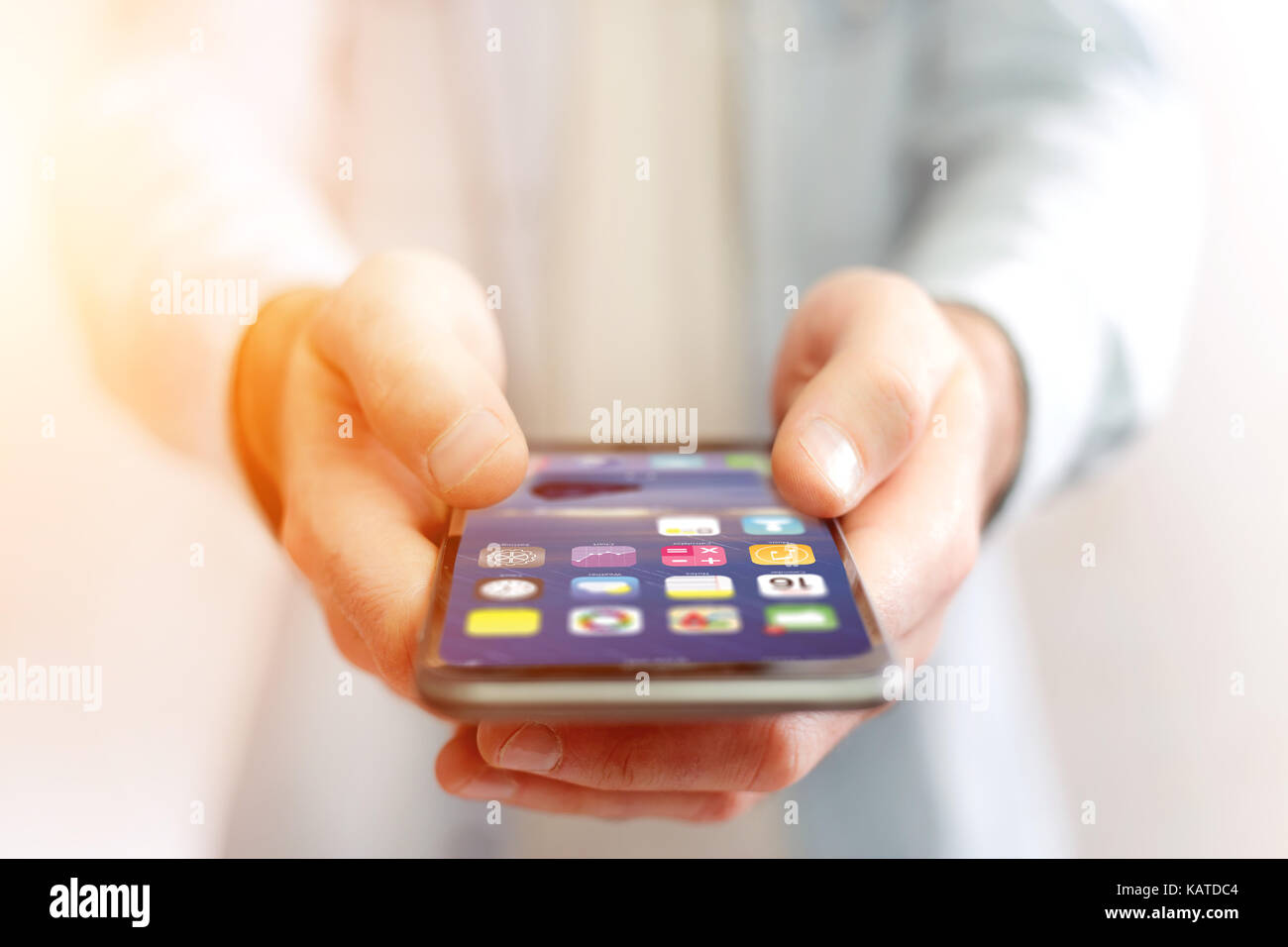 View of a Hand holding black smartphone with operating system screen ...