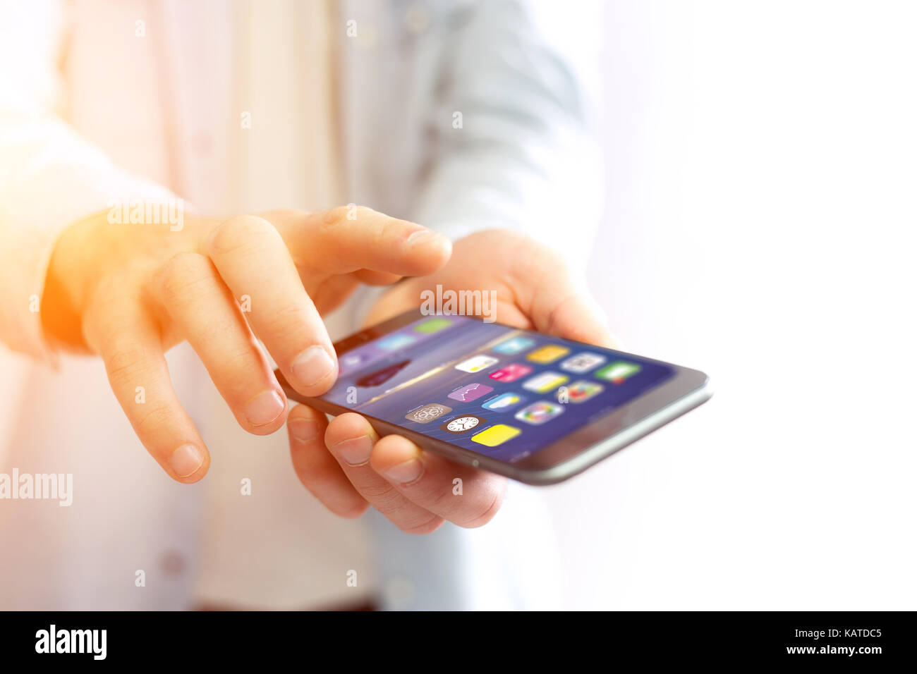 View of a Hand holding black smartphone with operating system screen ...