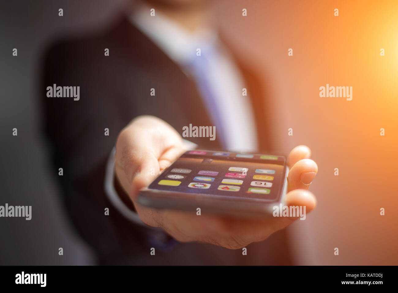 View of a Hand holding black smartphone with operating system screen ...