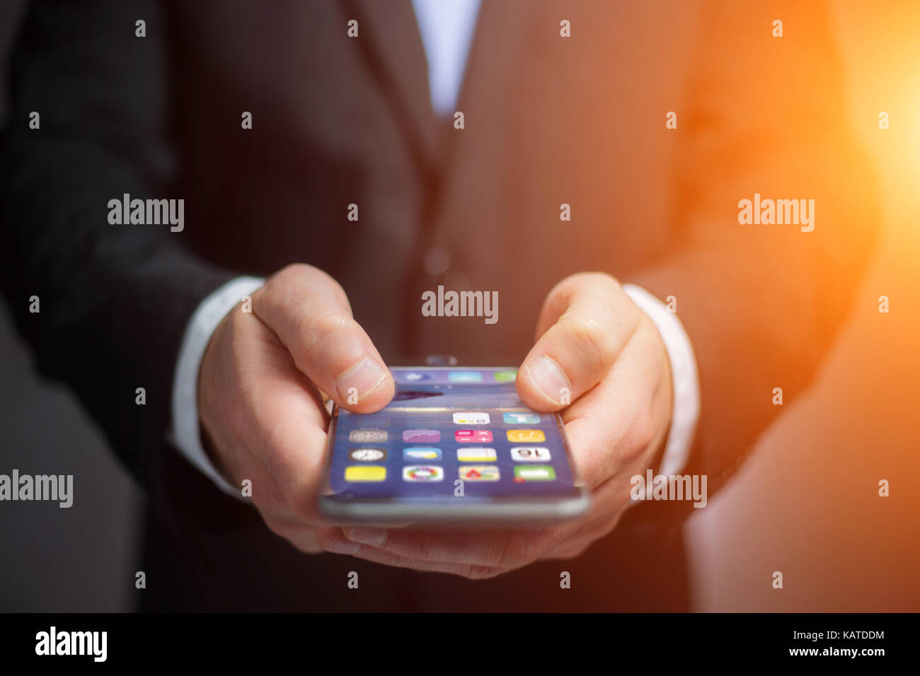 View of a Hand holding black smartphone with operating system screen ...