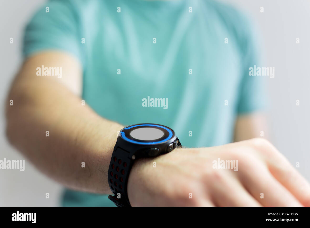 View of a Hand holding black smartwatch with technology screen Stock ...