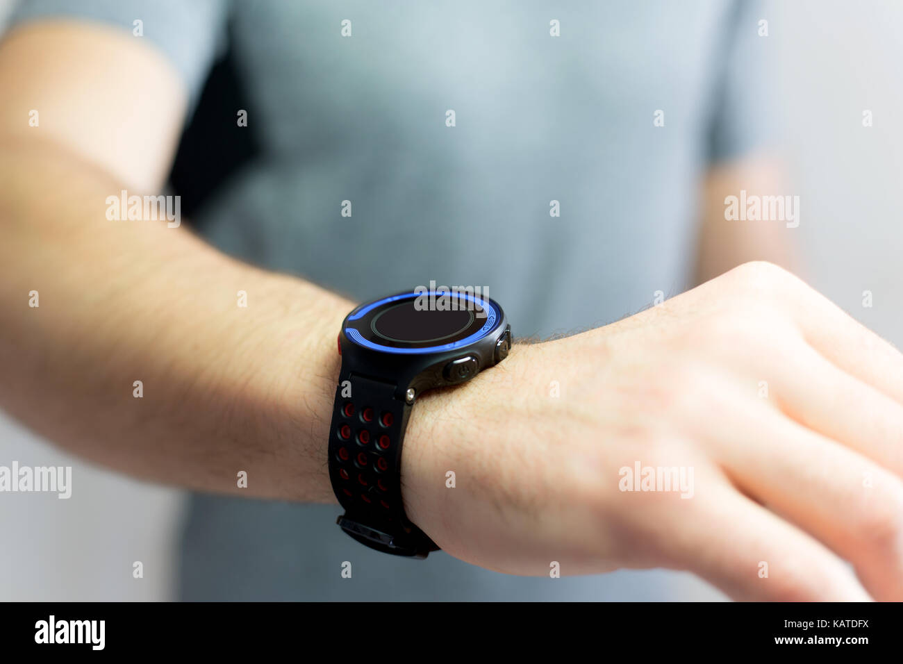 View of a Hand holding black smartwatch with technology screen Stock ...