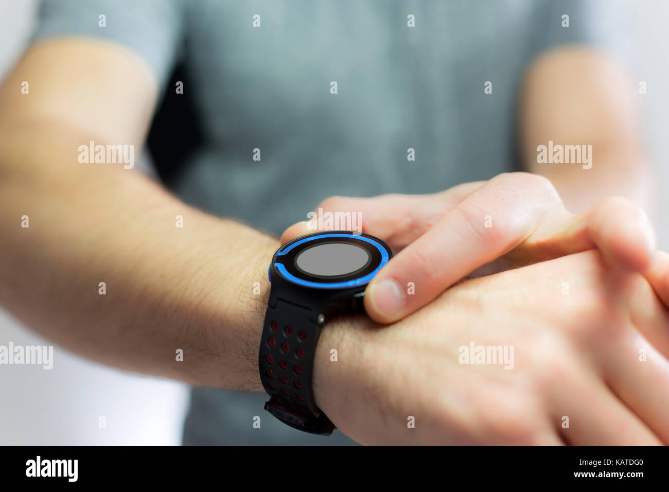 View of a Hand holding black smartwatch with technology screen Stock ...