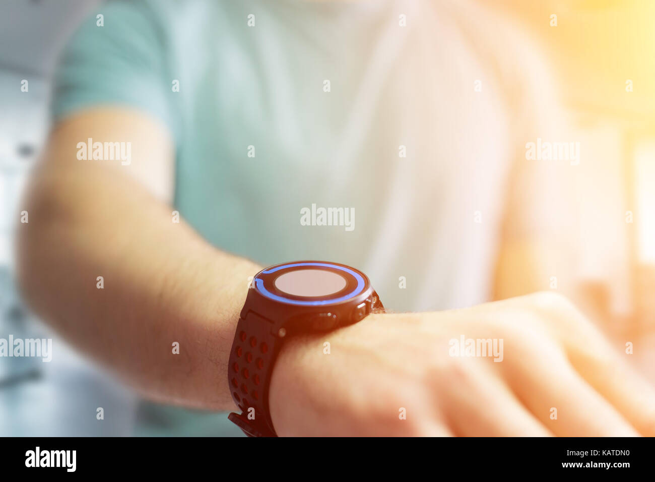 View of a Hand holding black smartwatch with technology screen Stock ...