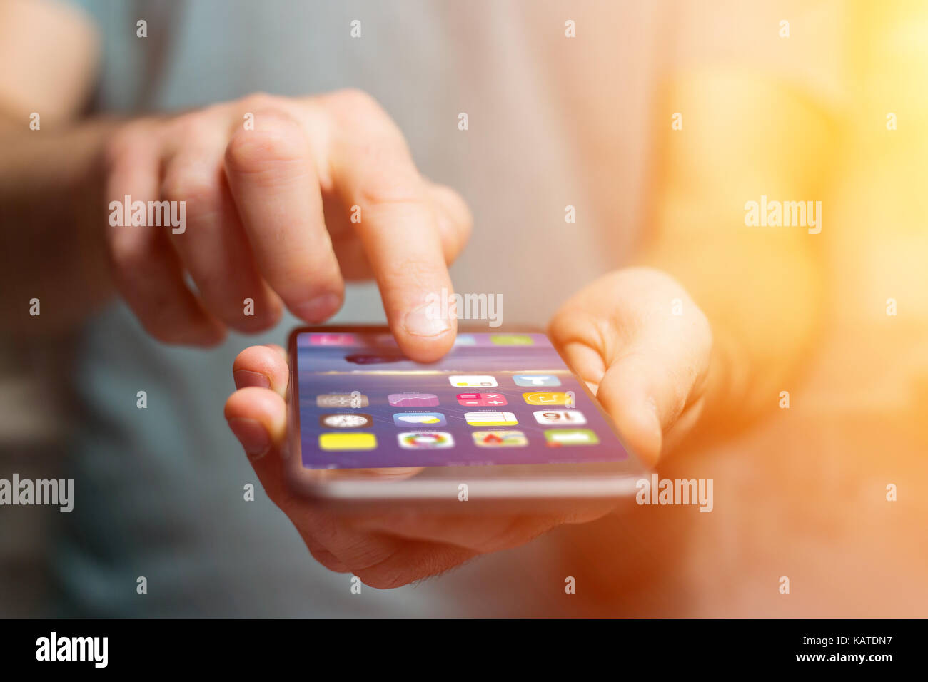View of a Hand holding black smartphone with operating system screen ...
