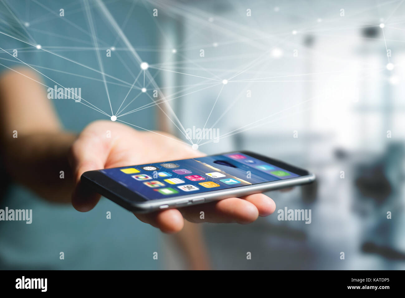 View of a Hand holding smartphone with operating system screen and ...