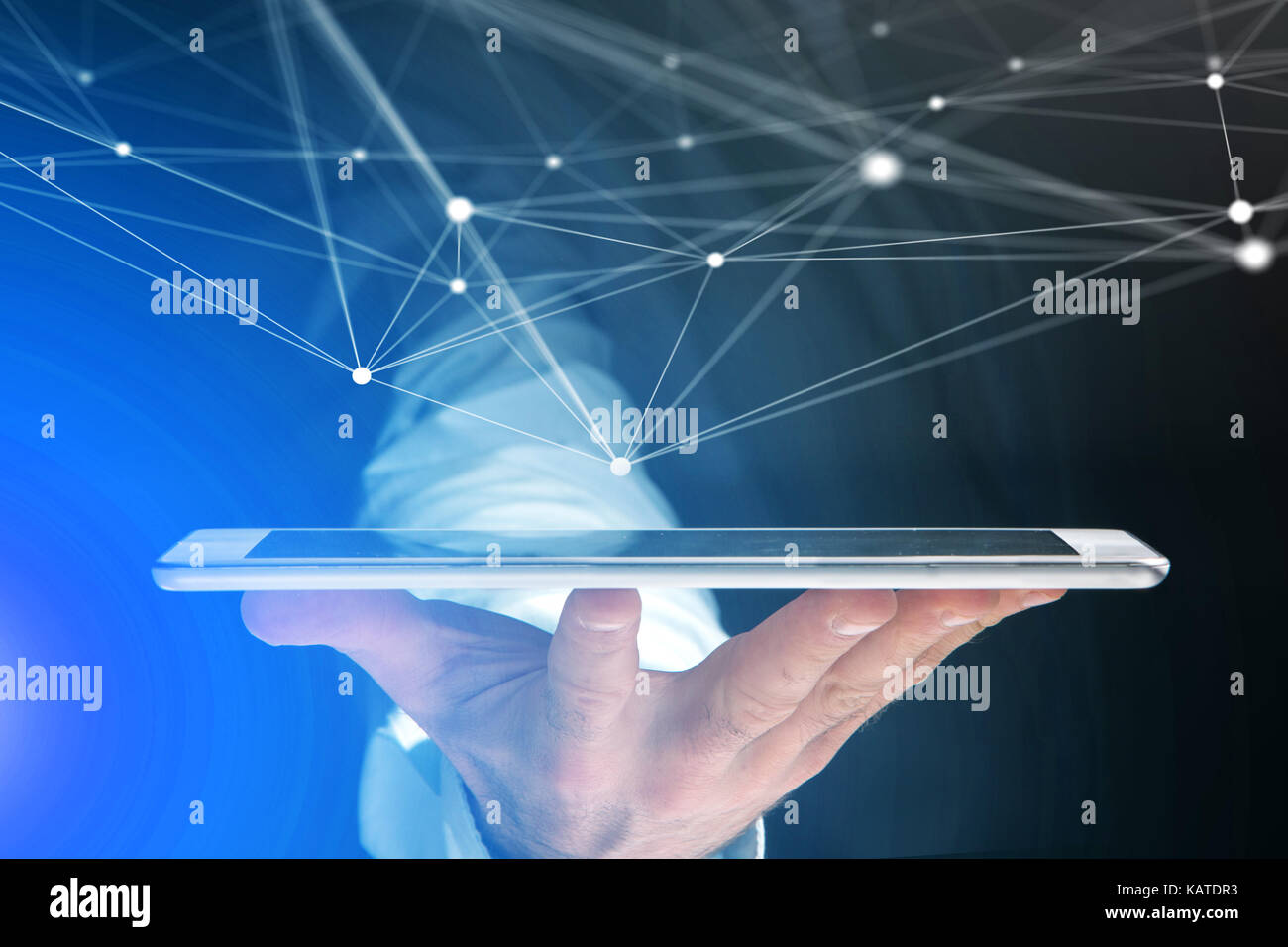 View of a Hand holding tablet with operating system screen and network ...