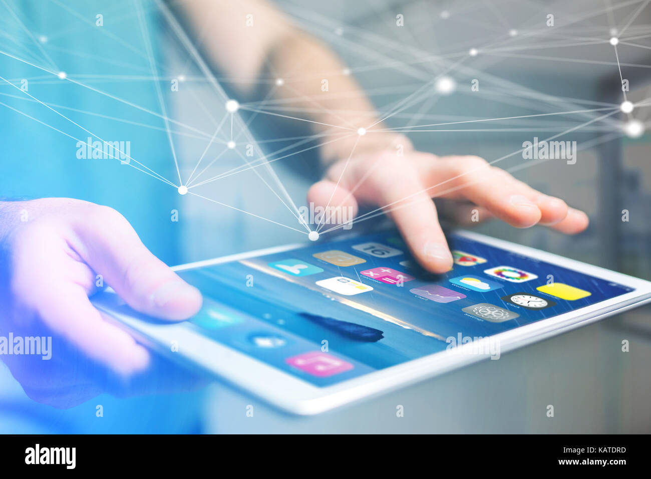 View of a Hand holding tablet with operating system screen and network ...