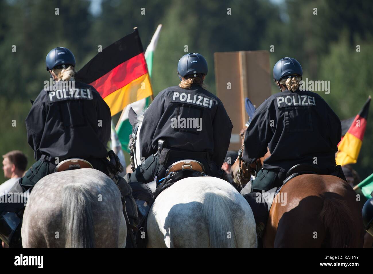 Police trainees and mounted policemen as well as their horses ...