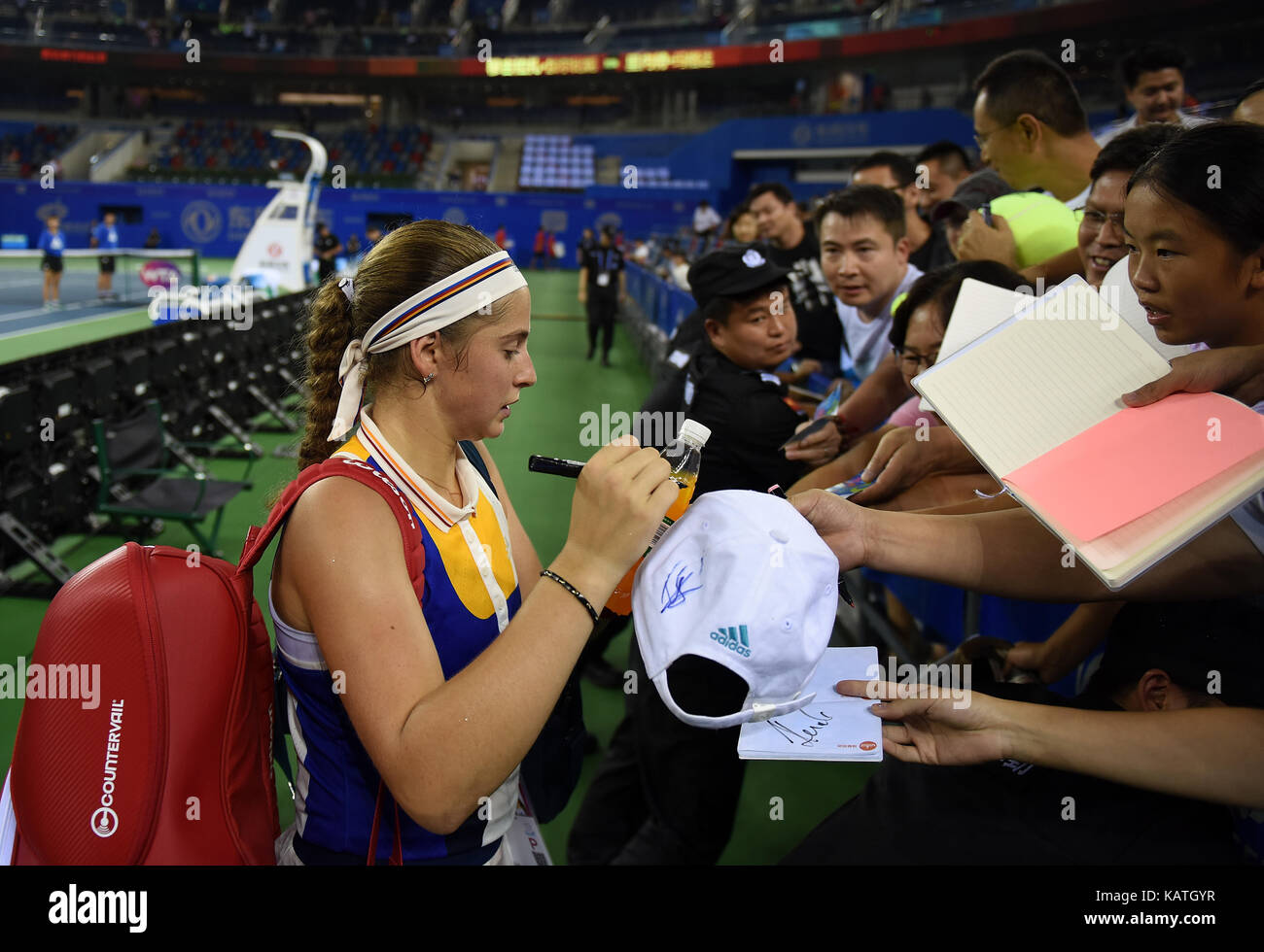 Wuhan, China. 27th Sep, 2017. Jelena Ostapenko of Latvia signs ...