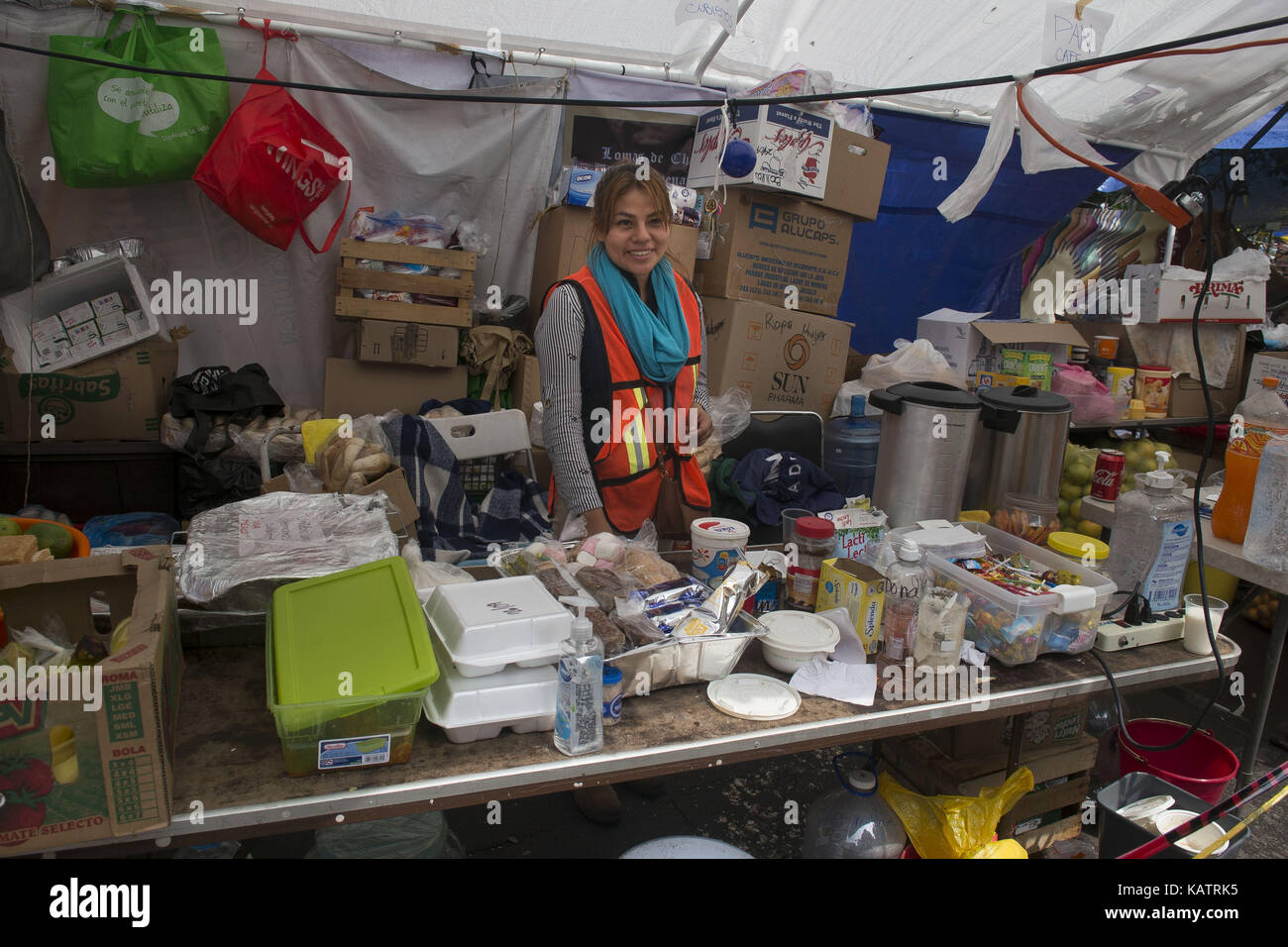 Volunteers prepare food for rescuers in disaster areas after the 7.1 ...