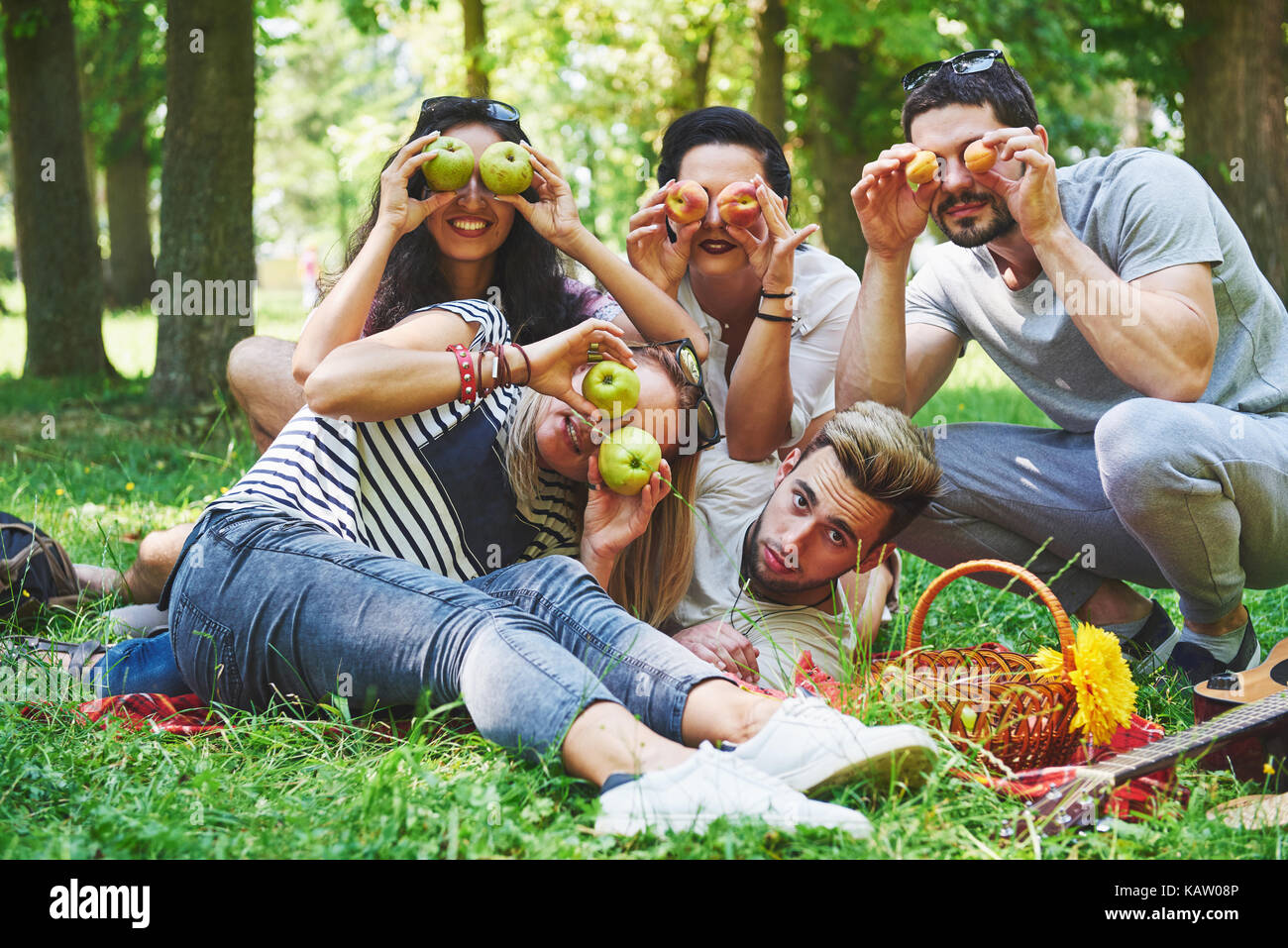 Happy friends having fun outside in nature Stock Photo - Alamy
