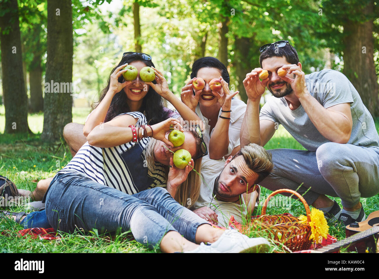 Happy friends having fun outside in nature Stock Photo - Alamy