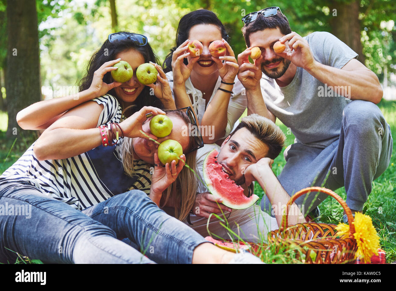 Happy friends having fun outside in nature Stock Photo - Alamy