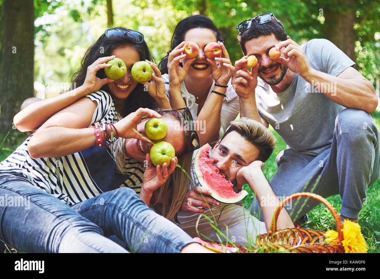 Happy friends having fun outside in nature Stock Photo - Alamy