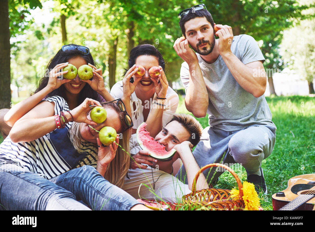 Happy friends having fun outside in nature Stock Photo - Alamy