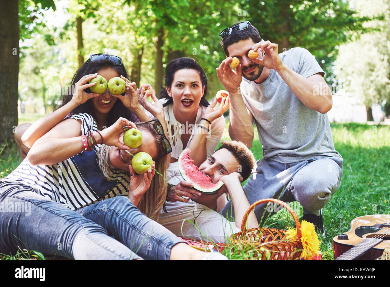 Happy friends having fun outside in nature Stock Photo - Alamy