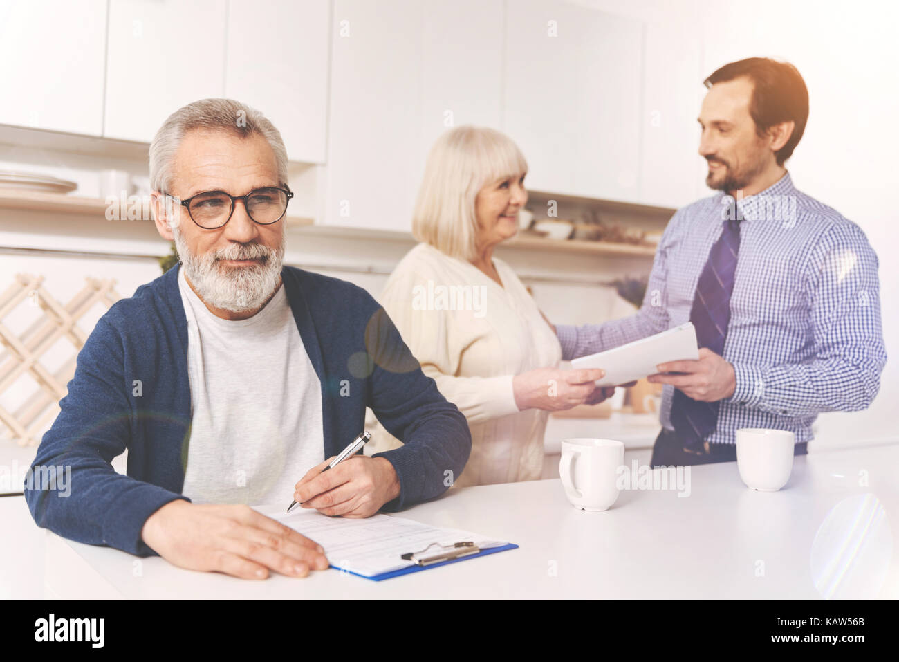 Man Signing Papers High Resolution Stock Photography and Images - Alamy