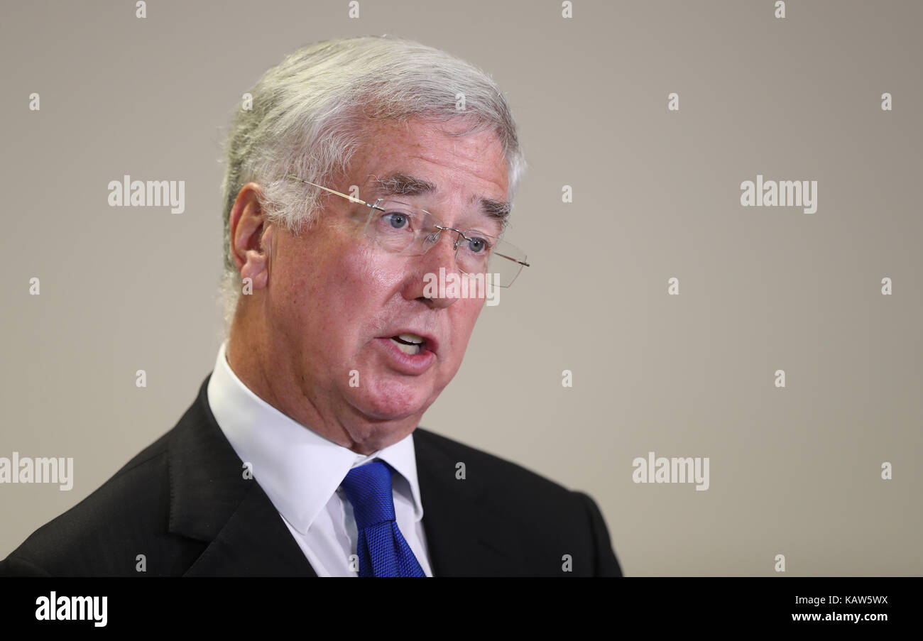 Defence Secretary Sir Michael Fallon speaking to the media about ...