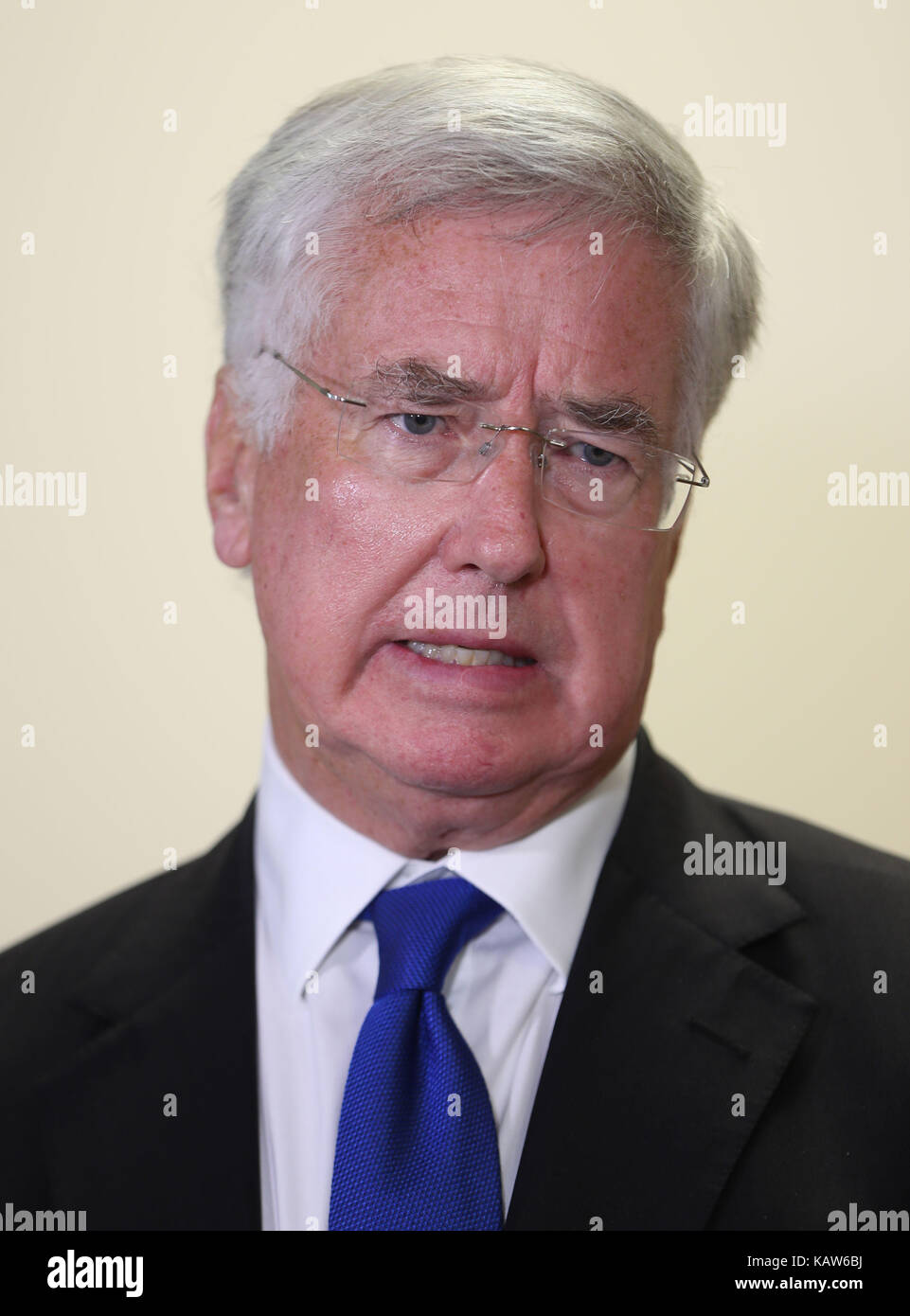 Defence Secretary Sir Michael Fallon speaking to the media about ...