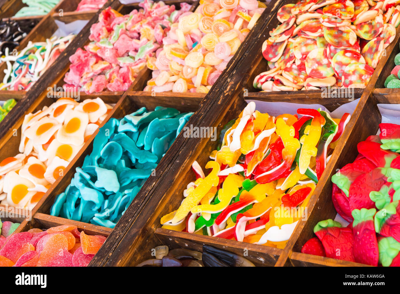 Many colorful candies on market stand Stock Photo - Alamy