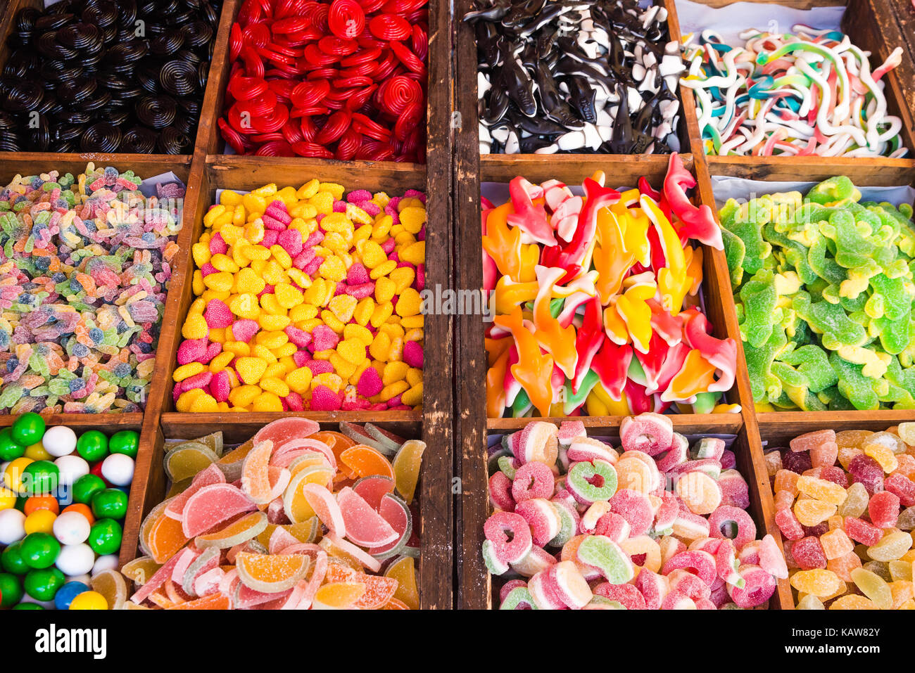 Many colorful candies on market stand Stock Photo - Alamy