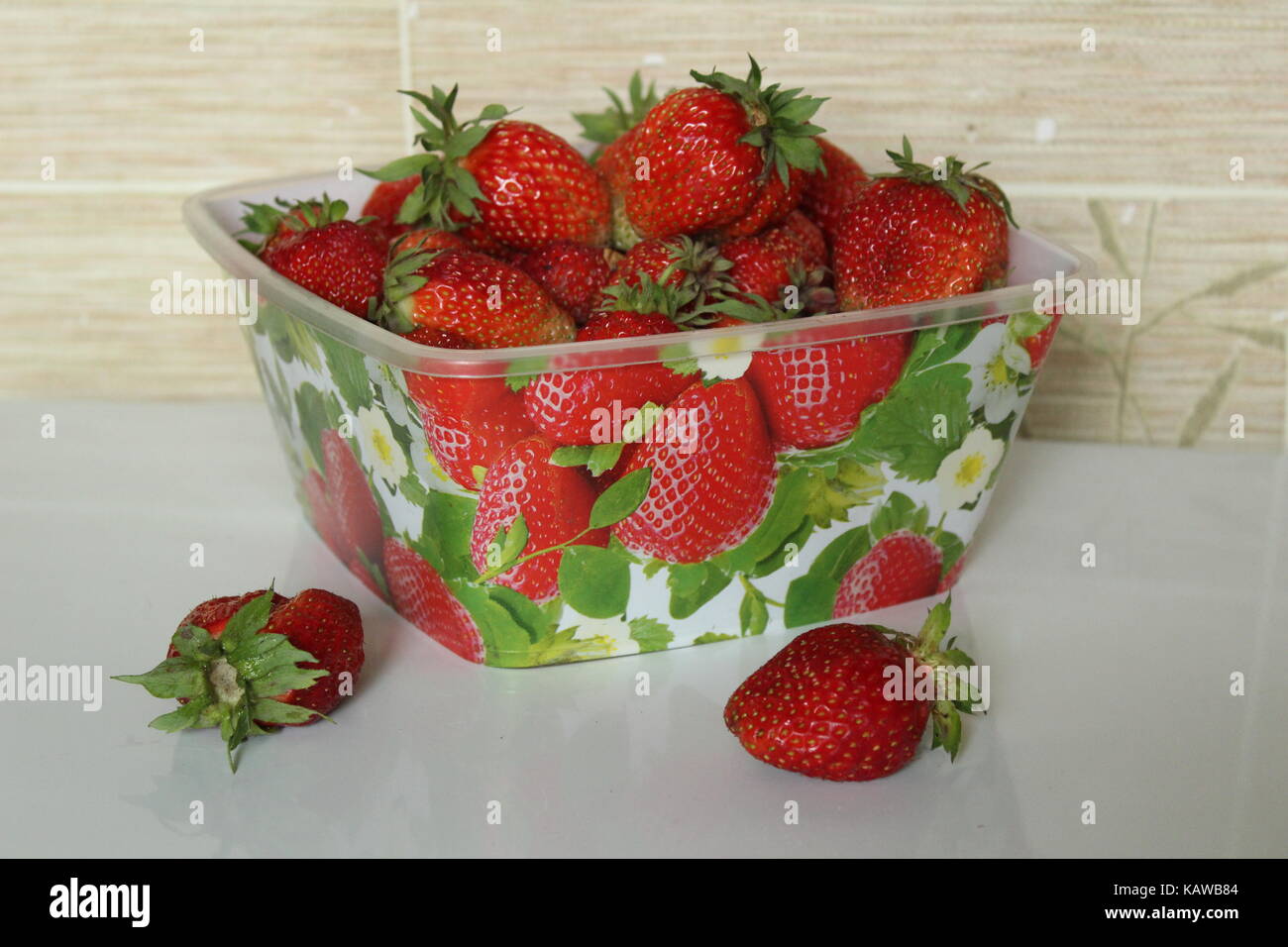 Fresh ripe strawberry in a box with a picture of a strawberry Stock ...