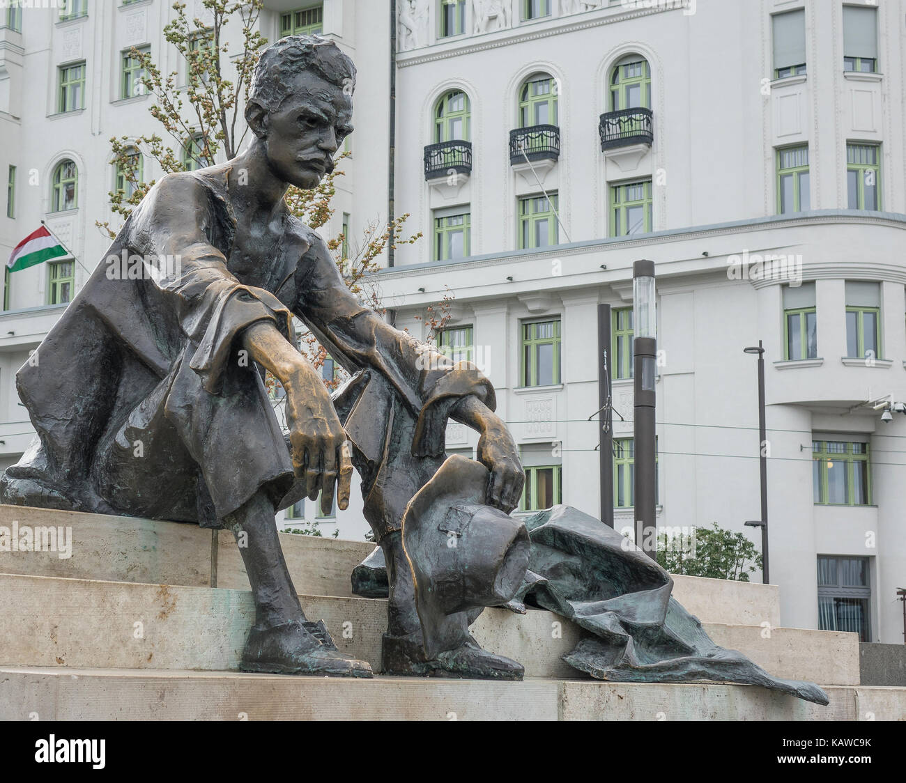 Hungary, Budapest, statue of poet Jozsef Attila on Parliament steps ...