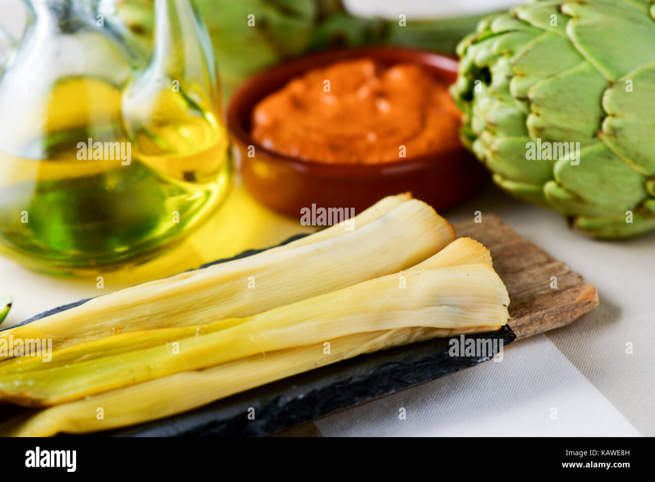 some roasted calcots, sweet onions typical of Catalonia, Spain, and an ...