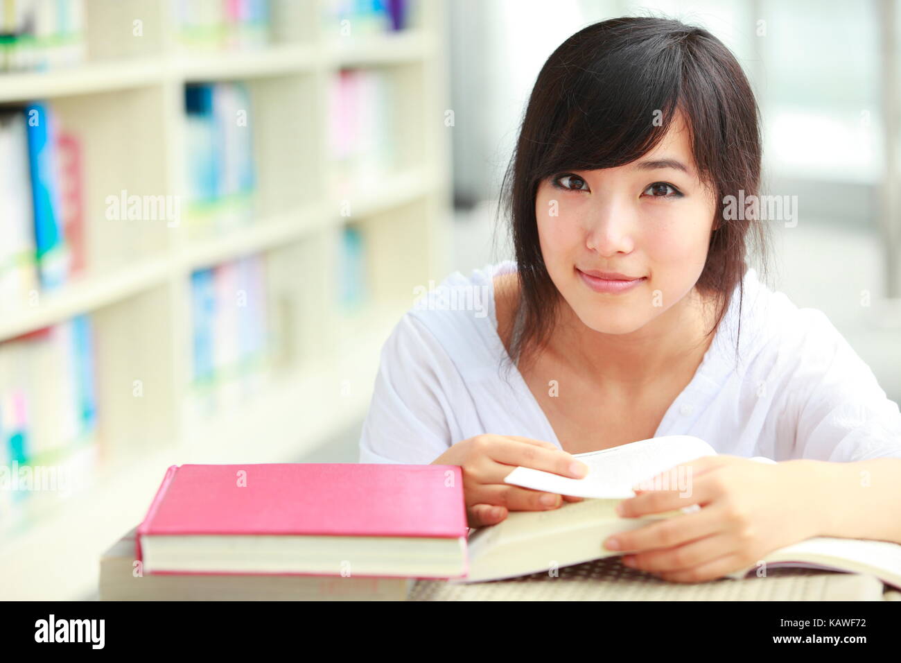 one young Chinese college student study in the college library Stock ...