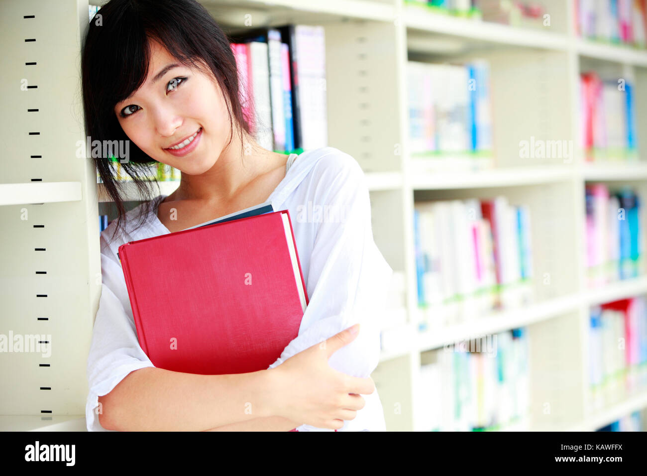 one young Chinese college student study in the college library Stock ...